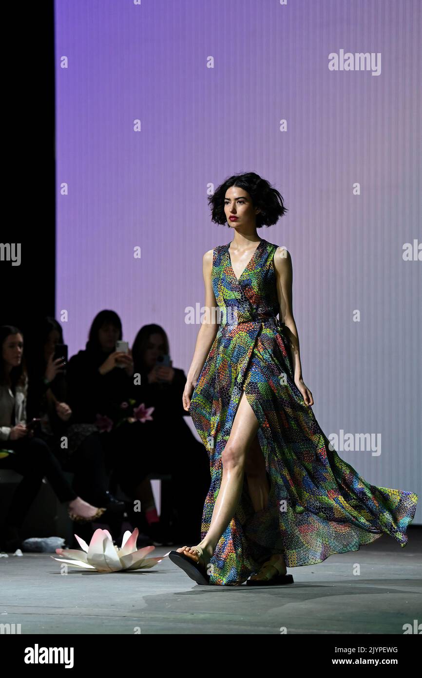 Models walk the runway during the Indigenous Fashion Projects show at ...