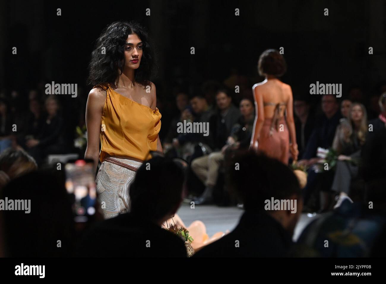 Models walk the runway during the Indigenous Fashion Projects show at ...