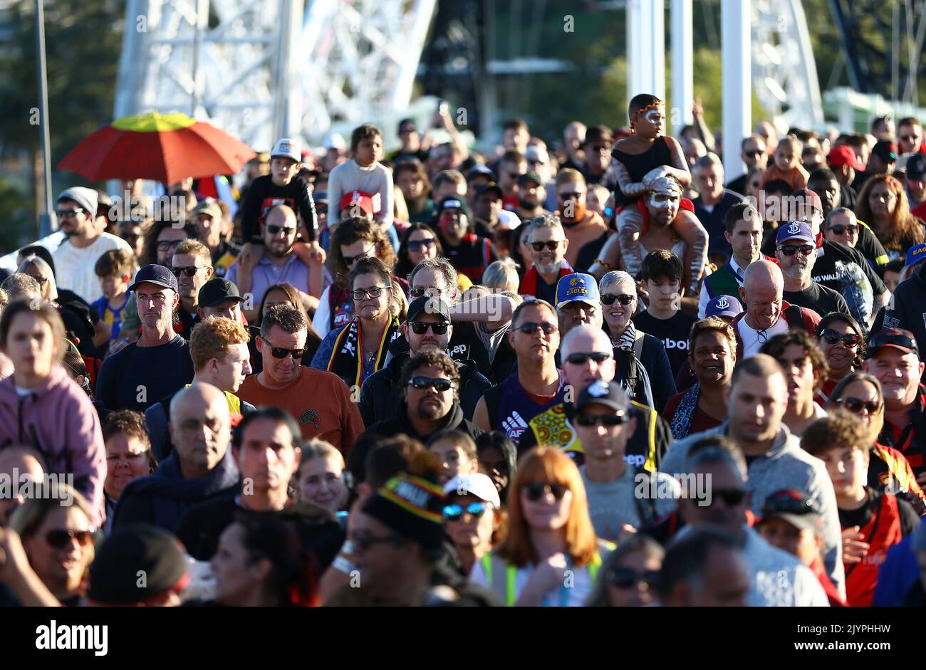 Fans are seen crossing the Matagarup Bridge during The Long Walk before ...