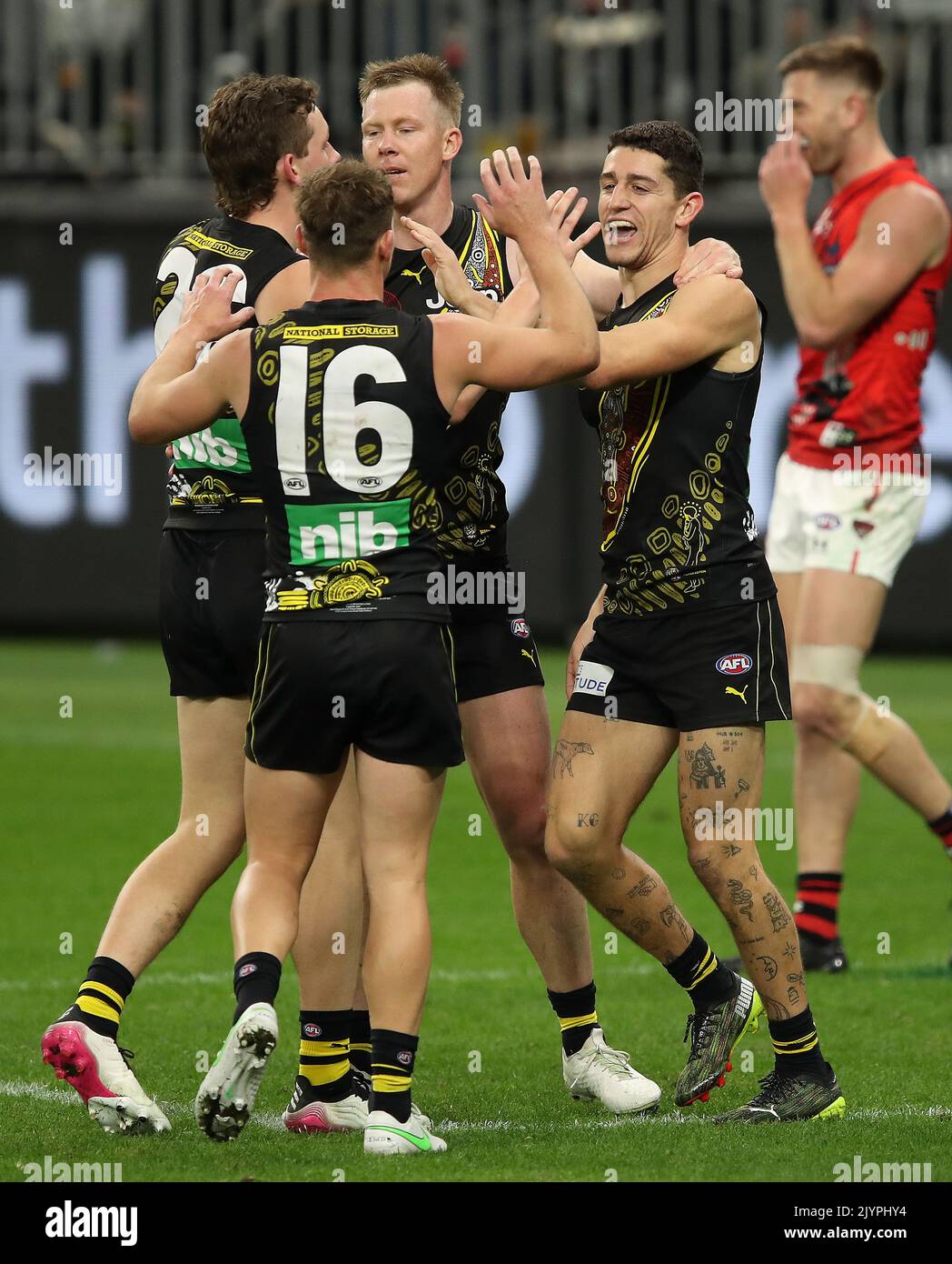 Jason Castagna of the Tigers celebrates kicking a goal during the Round ...