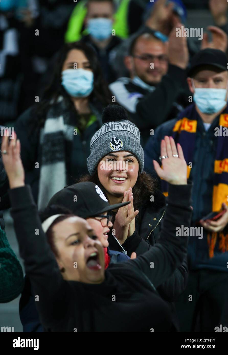 Happy Collingwood fans during the Round 12 AFL match between the ...