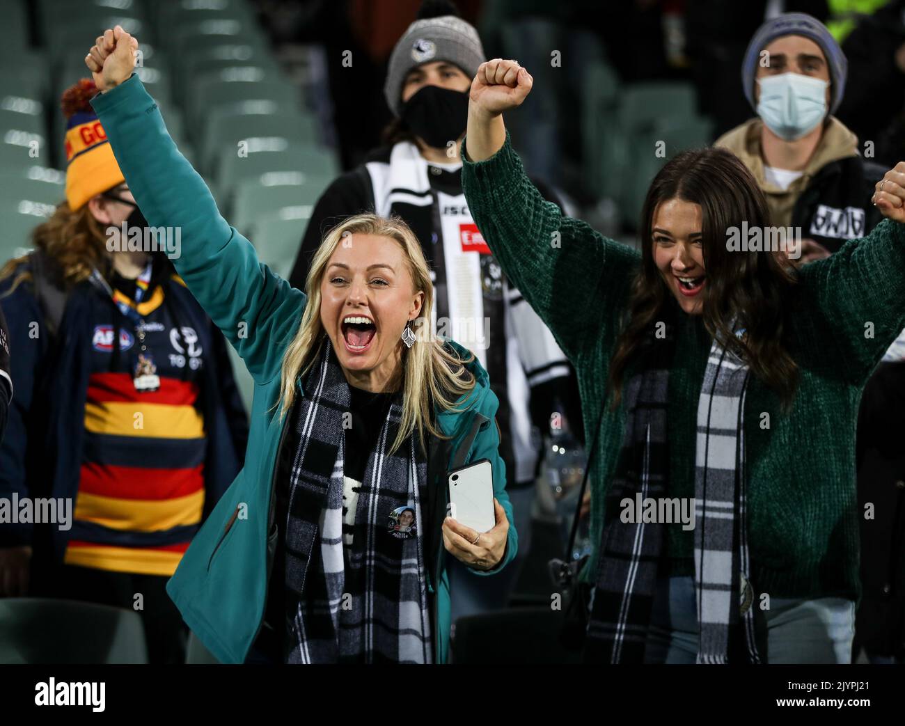 Happy Collingwood fans during the Round 12 AFL match between the ...
