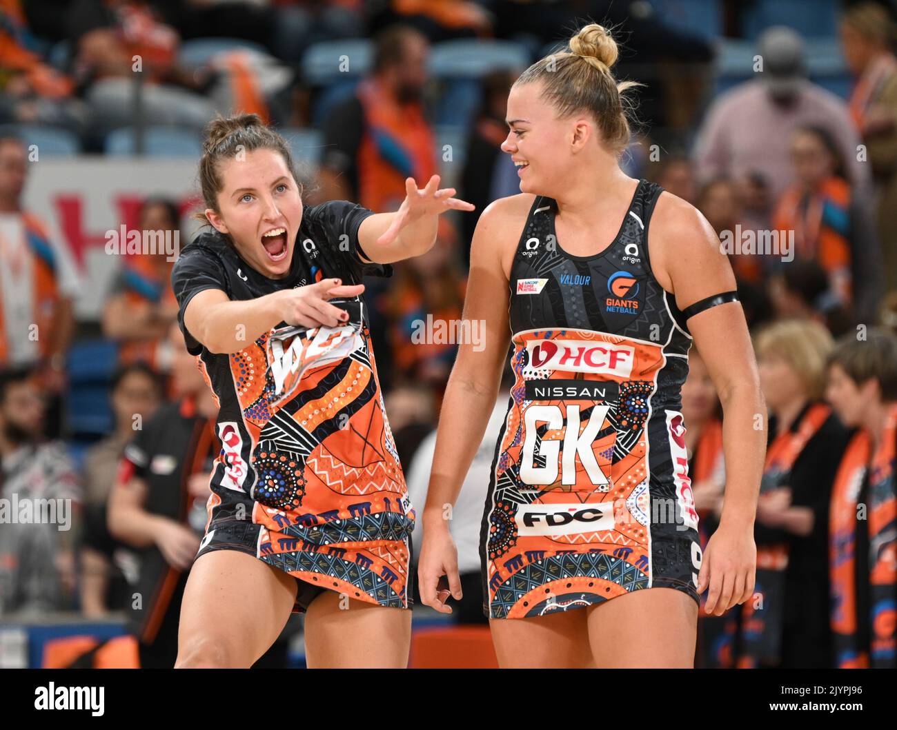 Amy Parmenter of the Giants reacts with Matilda McDonell of the Giants ...