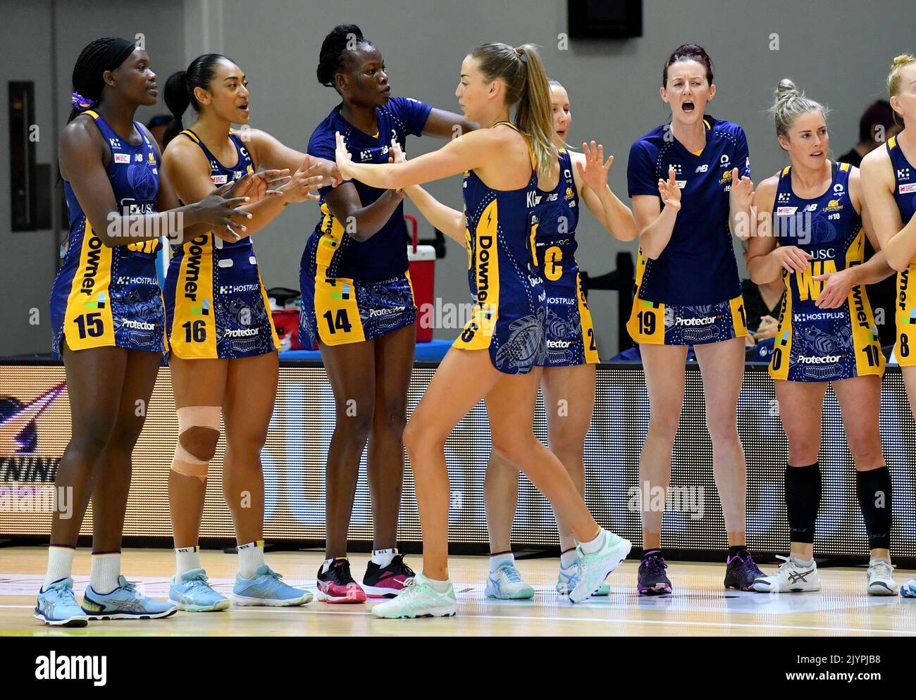 Cara Koenen (centre) of the Lightning is seen with team mates during ...