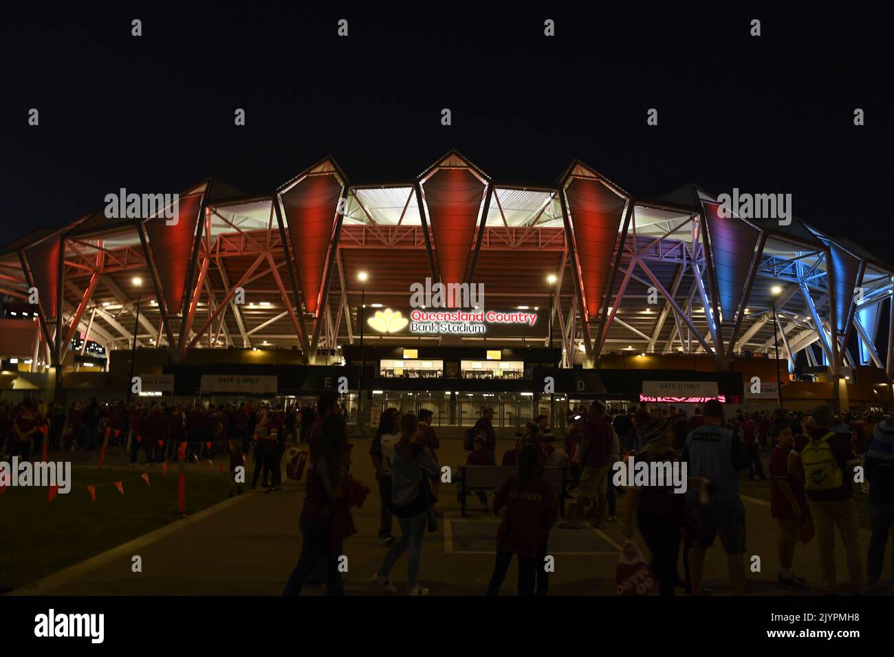 Queensland Country Bank Stadium is lit up in blue and maroon before ...