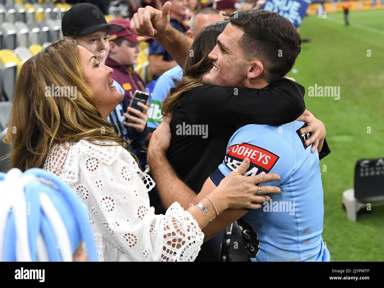 Nathan Cleary (right) of the Blues celebrates winning with his family ...
