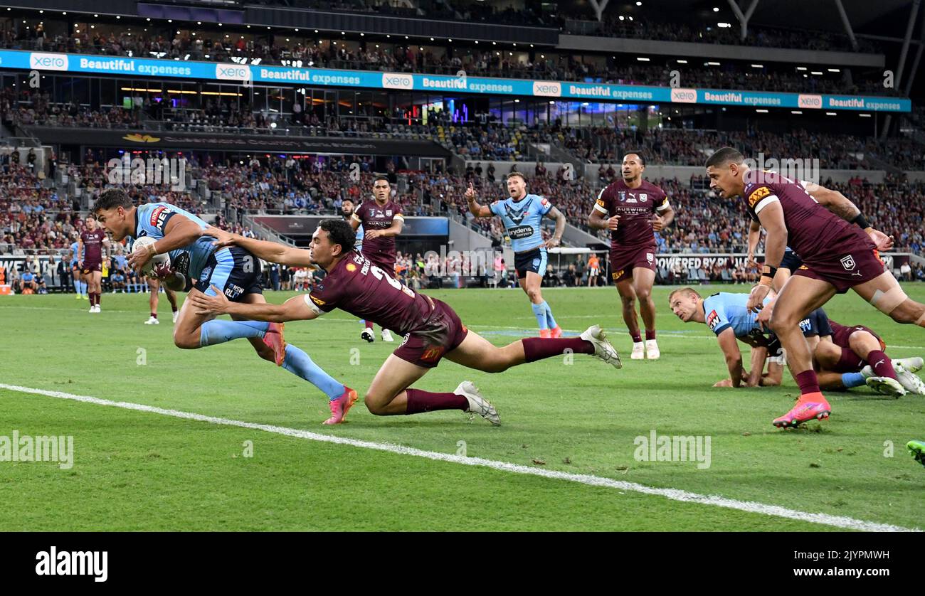 Latrell Mitchell (left) of the Blues gets past Xavier Coates of the ...