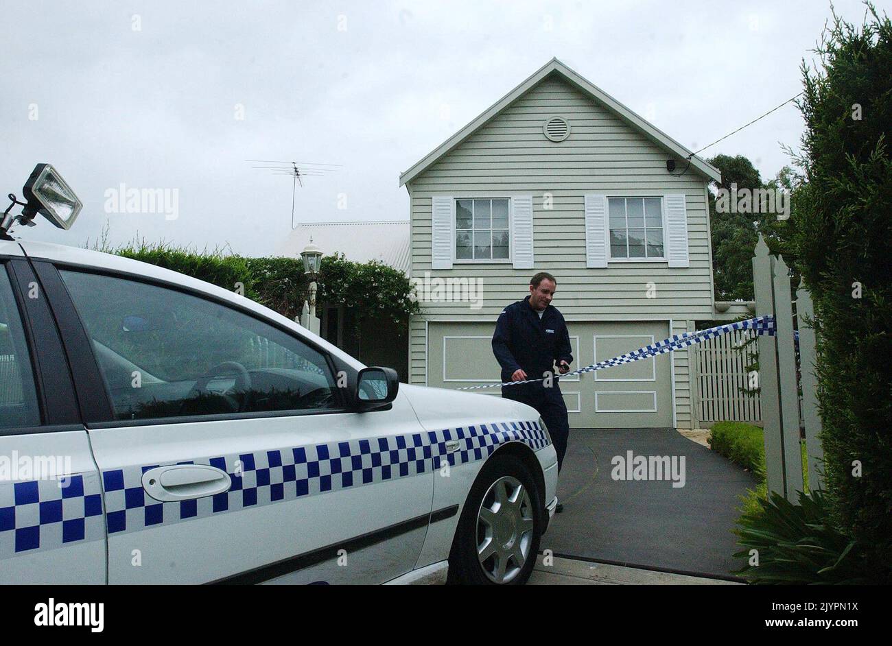 Mornington, Victoria, June 23, 2004. A Police car in the driveway of ...