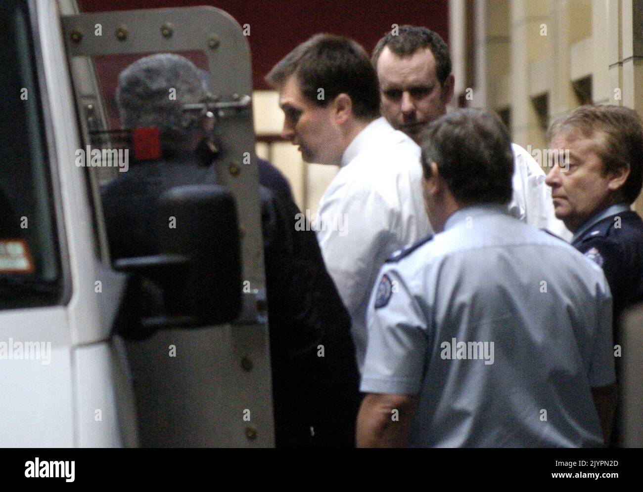 Melbourne, August 5, 2005. John Myles Sharpe is led away by prison ...