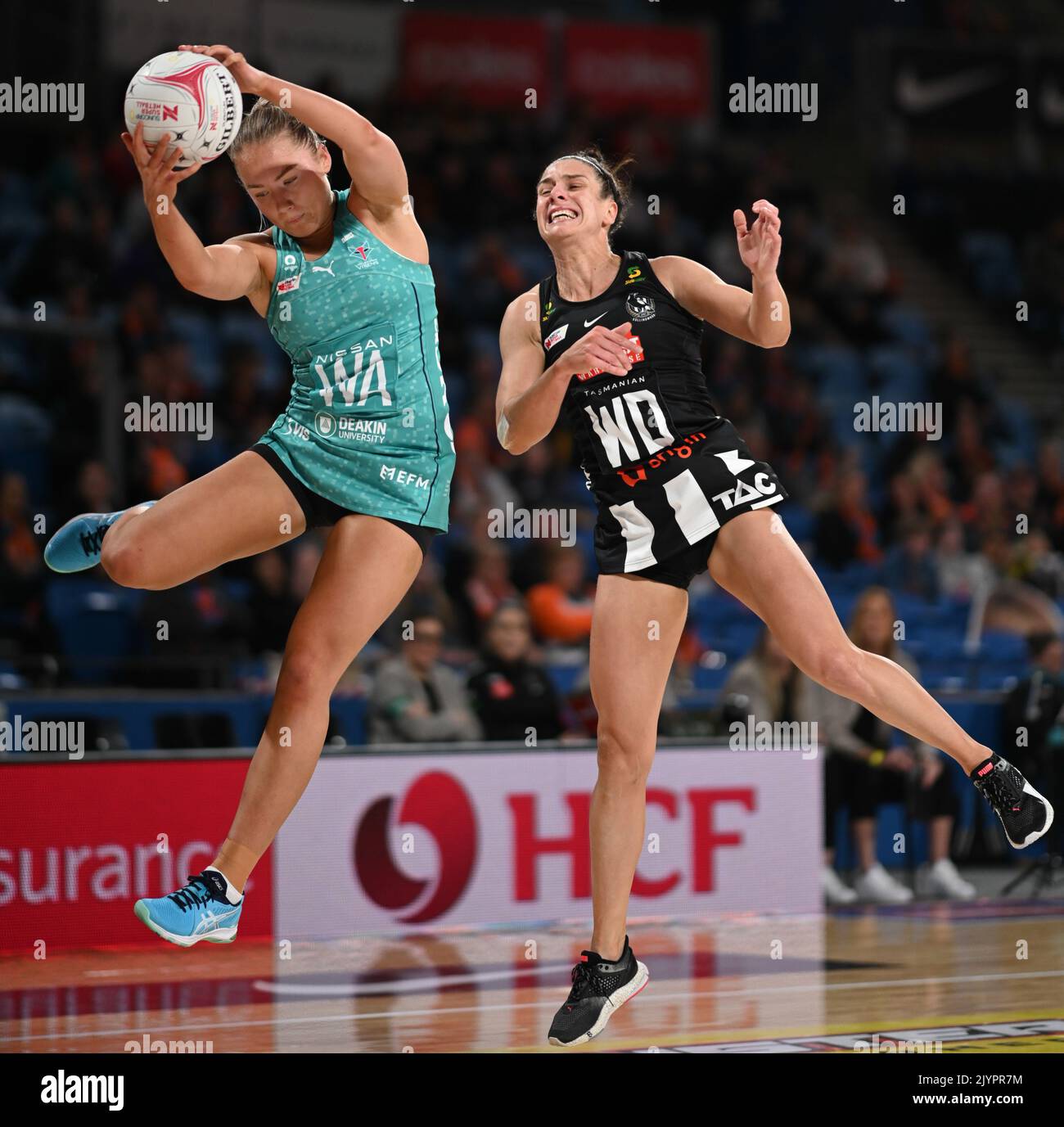 Hannah Mundy of the Vixens and Ash Brazill of the Magpies during the ...