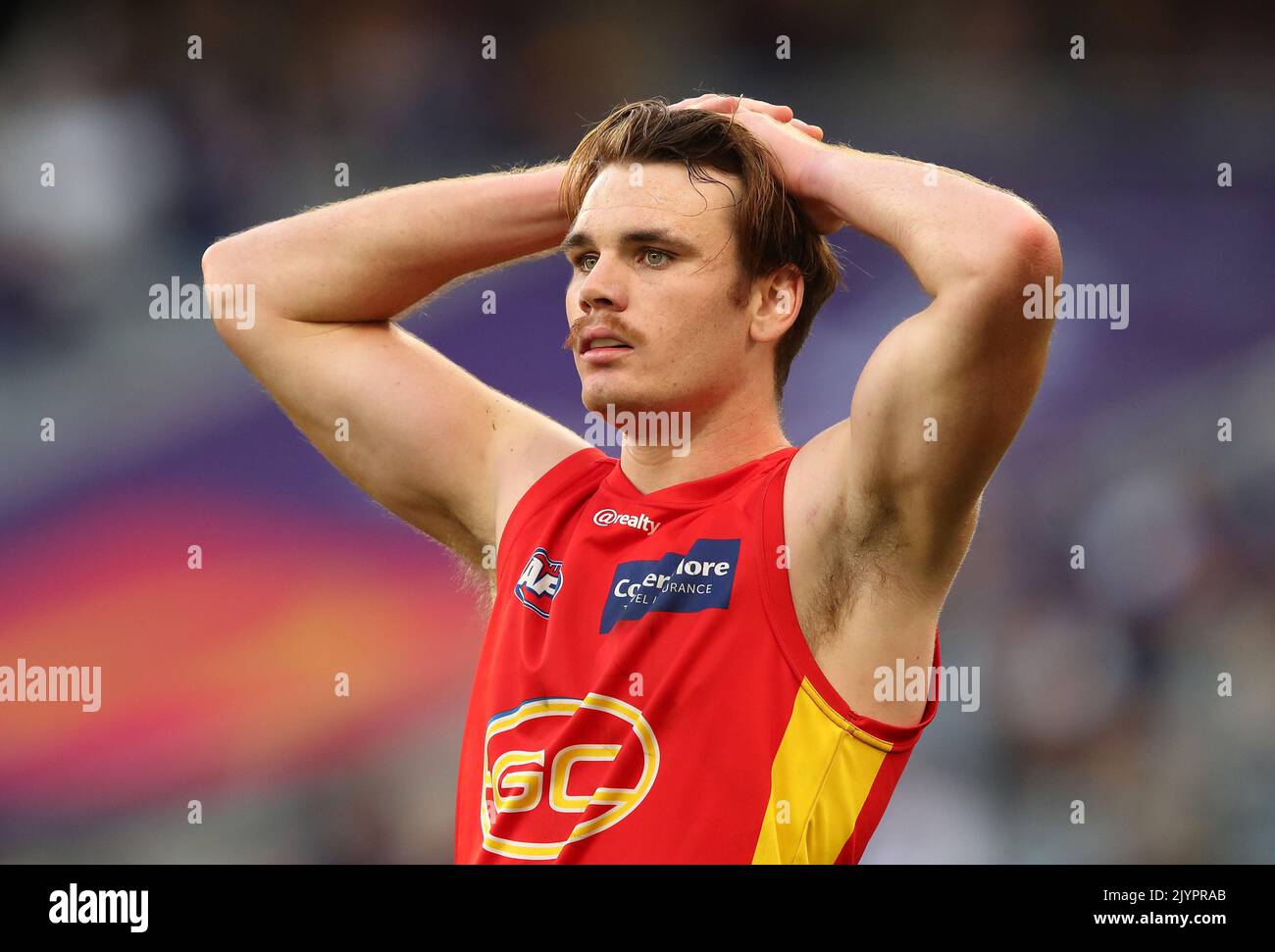 Caleb Graham of the Suns looks dejected during the Round 13 AFL match ...
