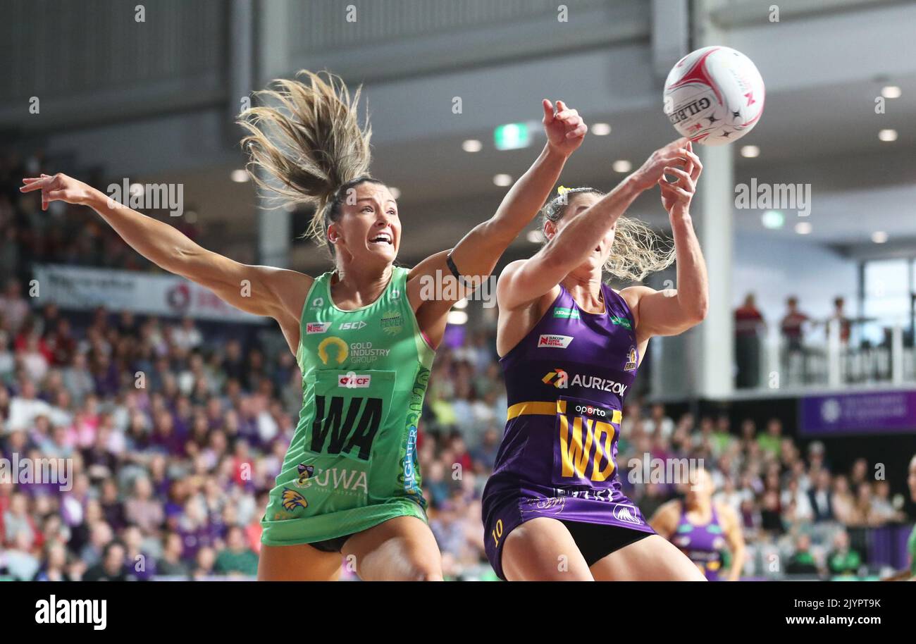 Verity Charles ( left ) of the Fever in action with Gabrielle Simpson ...