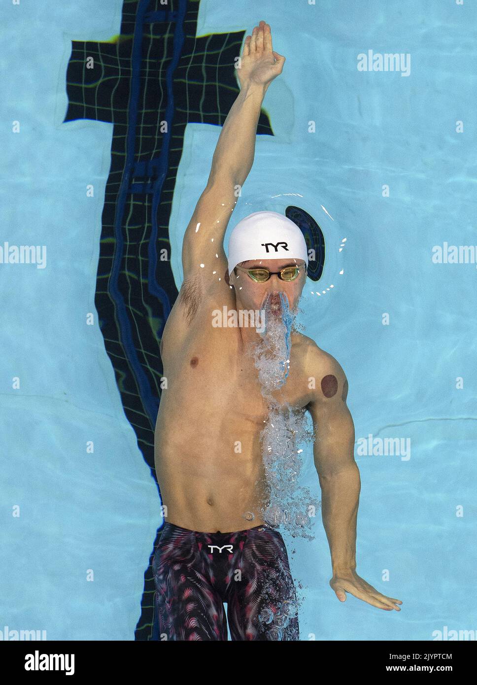 William Yang competes in the Men’s 100m Backstroke Heats at the ...