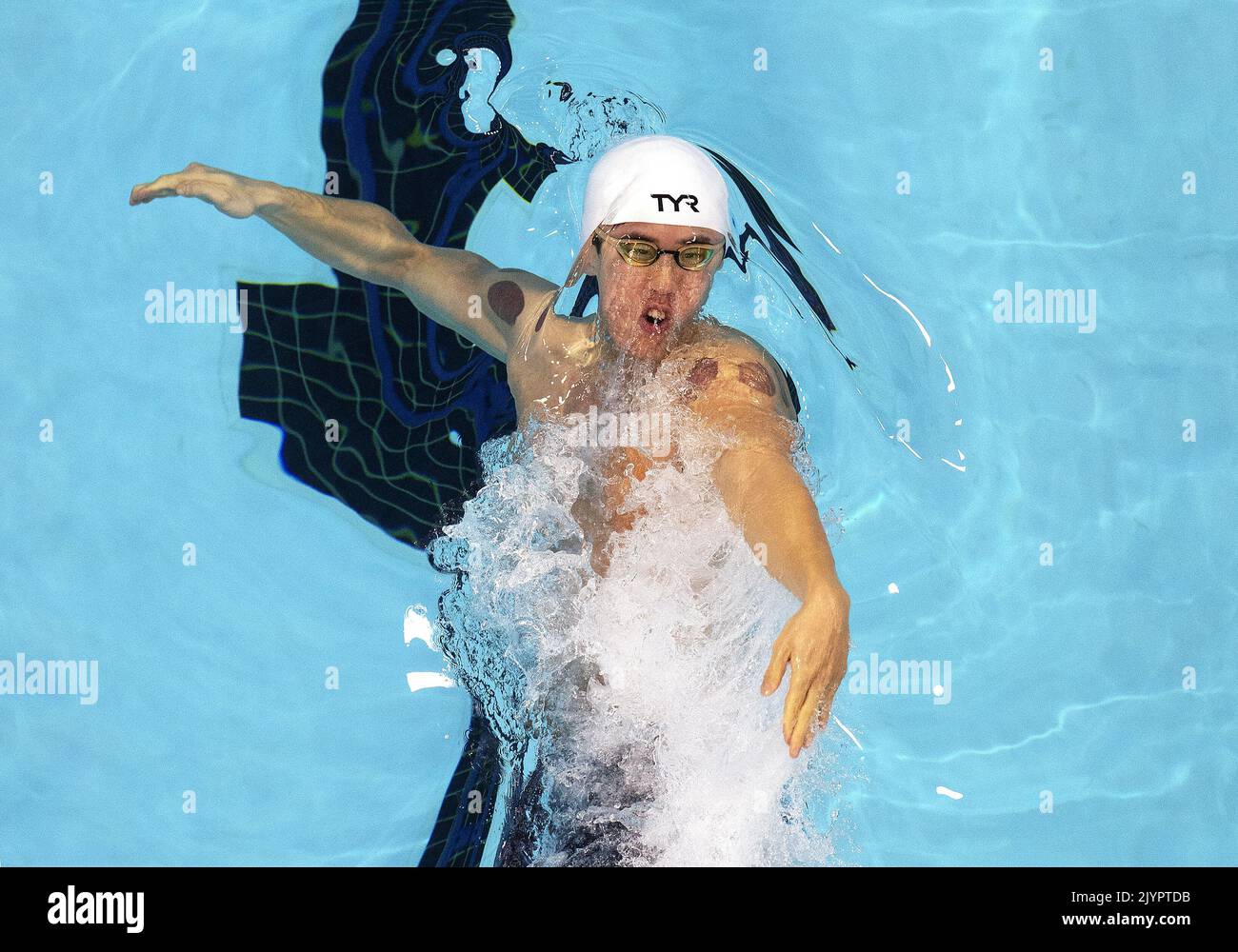 William Yang competes in the Men’s 100m Backstroke Heats at the ...