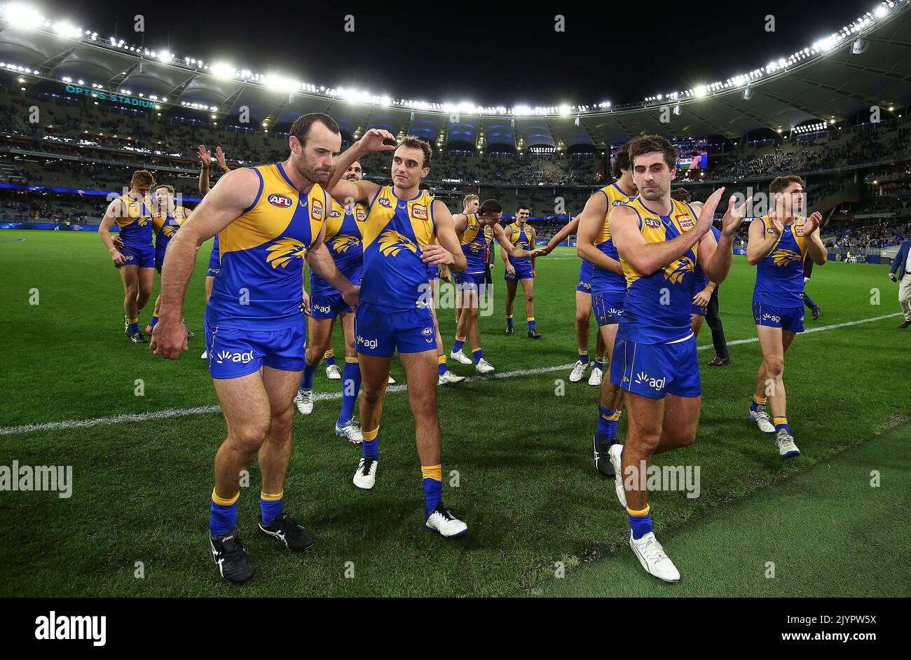 Shannon Hurn, Luke Edwards and Andrew Gaff of the Eagles leave the ...