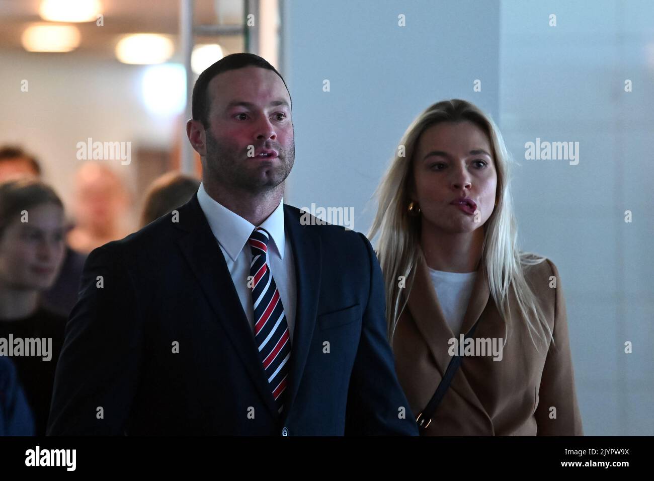 Boyd Cordner arrives with partner Jemma Barge to speak to the media at ...