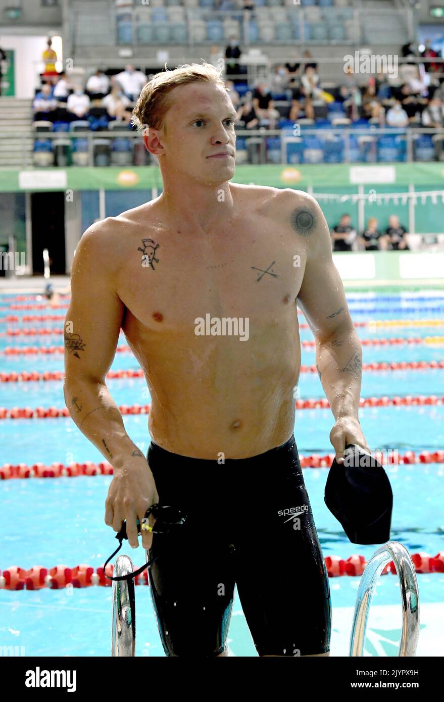 Cody Simpson looks on after swimming in the Men’s 100m Freestyle Heats ...