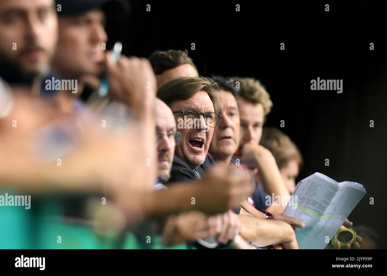 Coach Michael Bohl (centre) is seen amongst other coaches at the ...