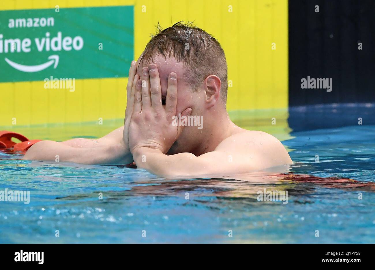 Matthew Wilson reacts after failing to qualify after the Men’s 200m ...