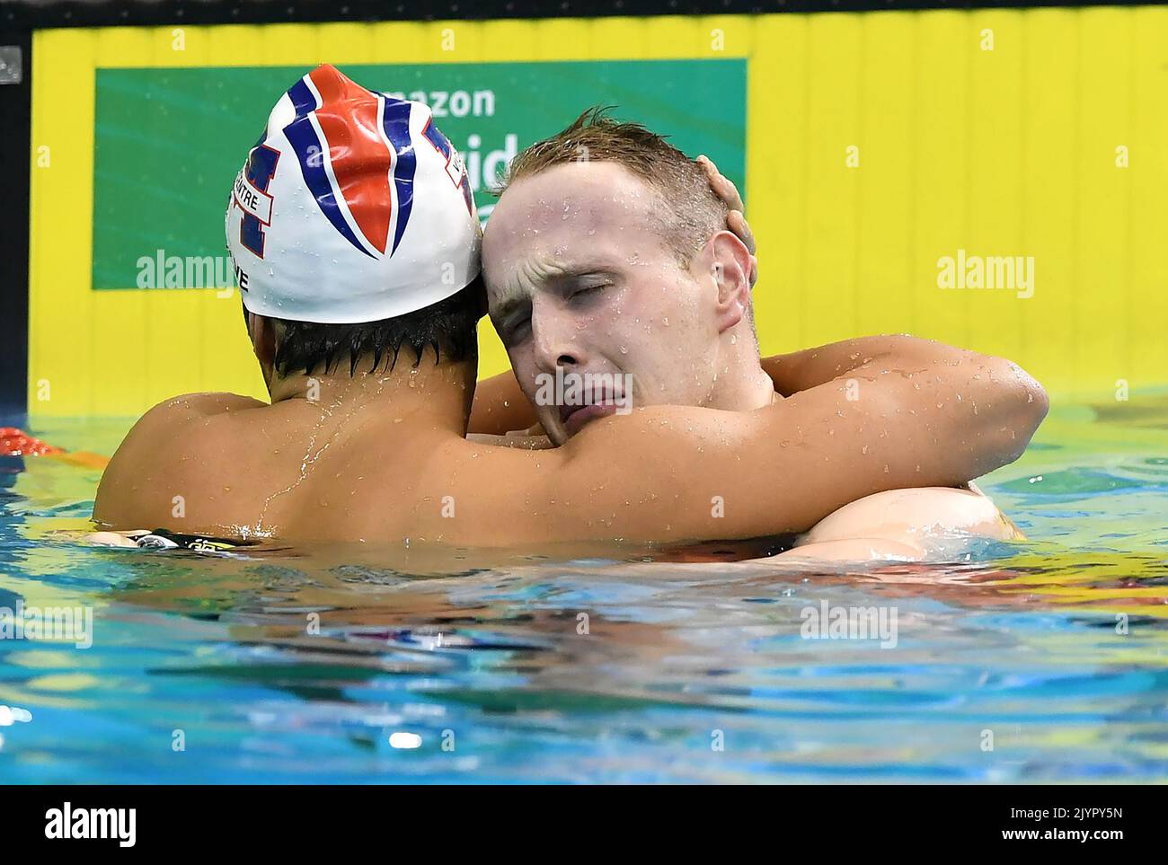 Matthew Wilson (right) is consoled after his swim in the Men’s 200m ...
