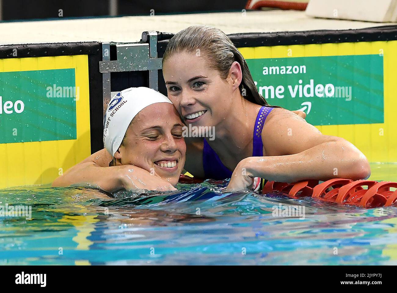 Maddy Gough (left) reacts with Kia Melverton after swimming the Women’s ...