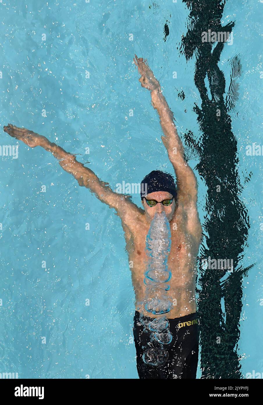 Joshua Edwards-Smith competes in the mens 100m Backstroke Heats during ...