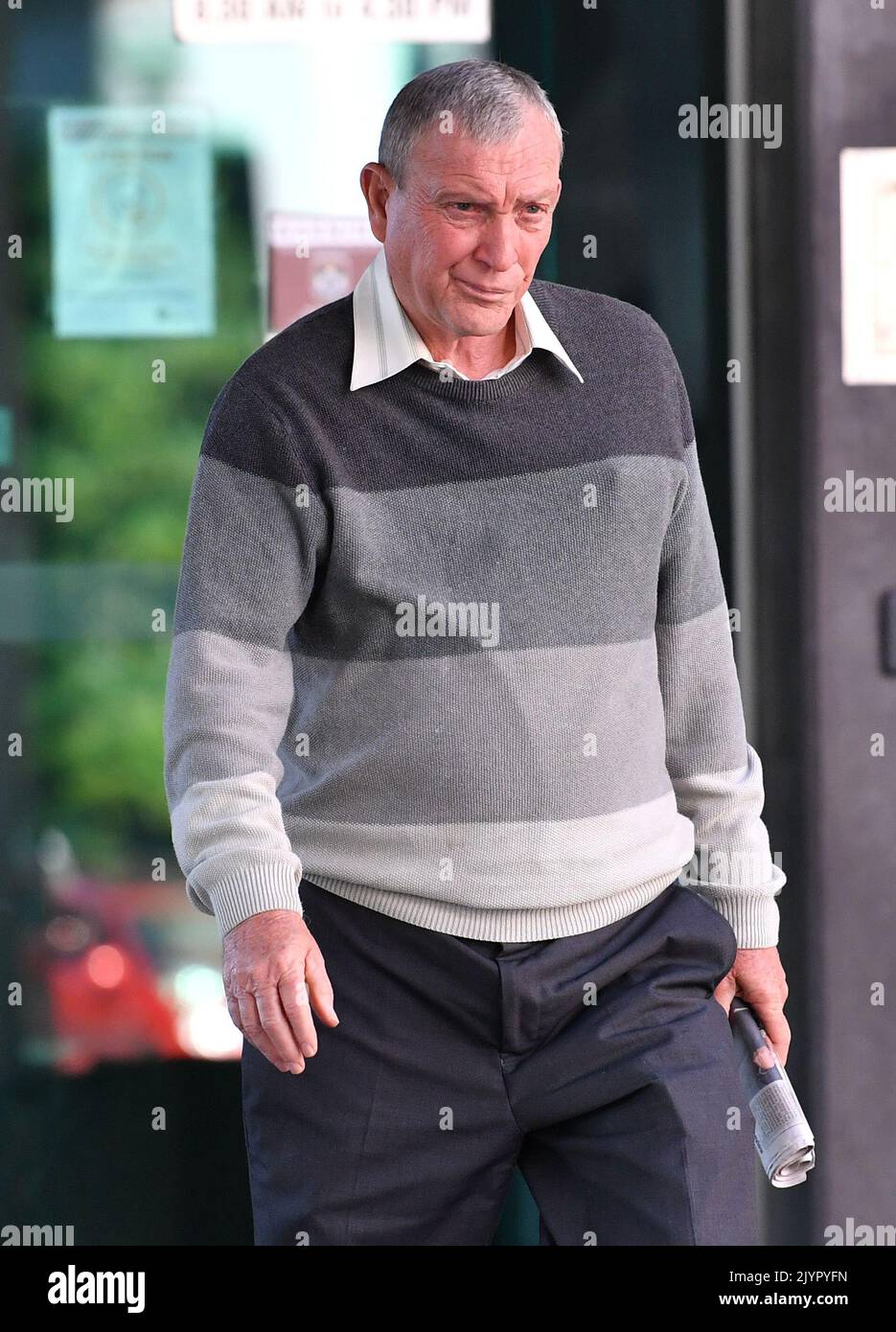 Witness Gregory Clark is seen leaving the inquest into the 1973 Whiskey ...