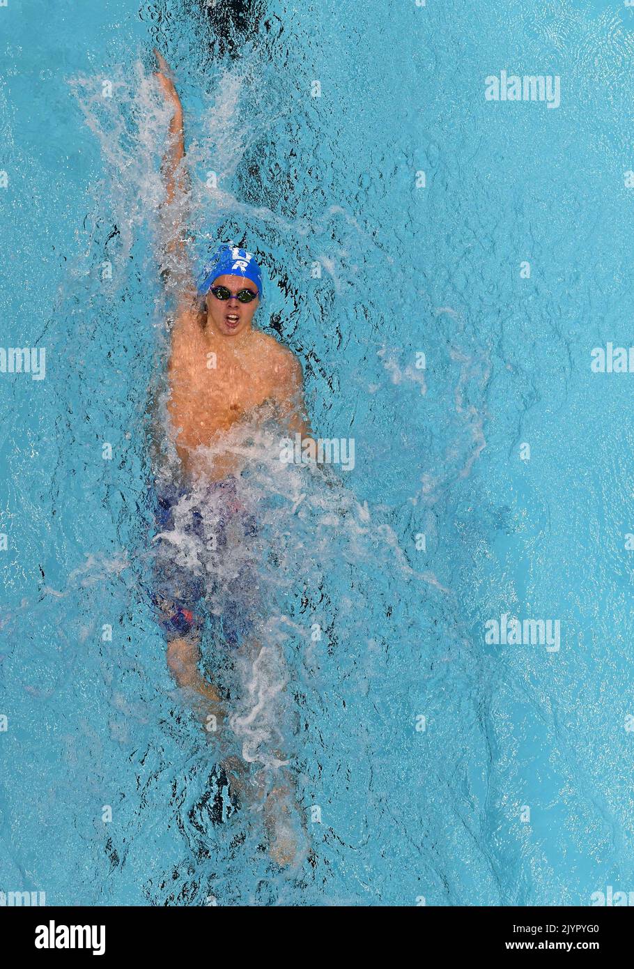 Isaac Cooper competes in the mens 100m Backstroke Heats during the ...