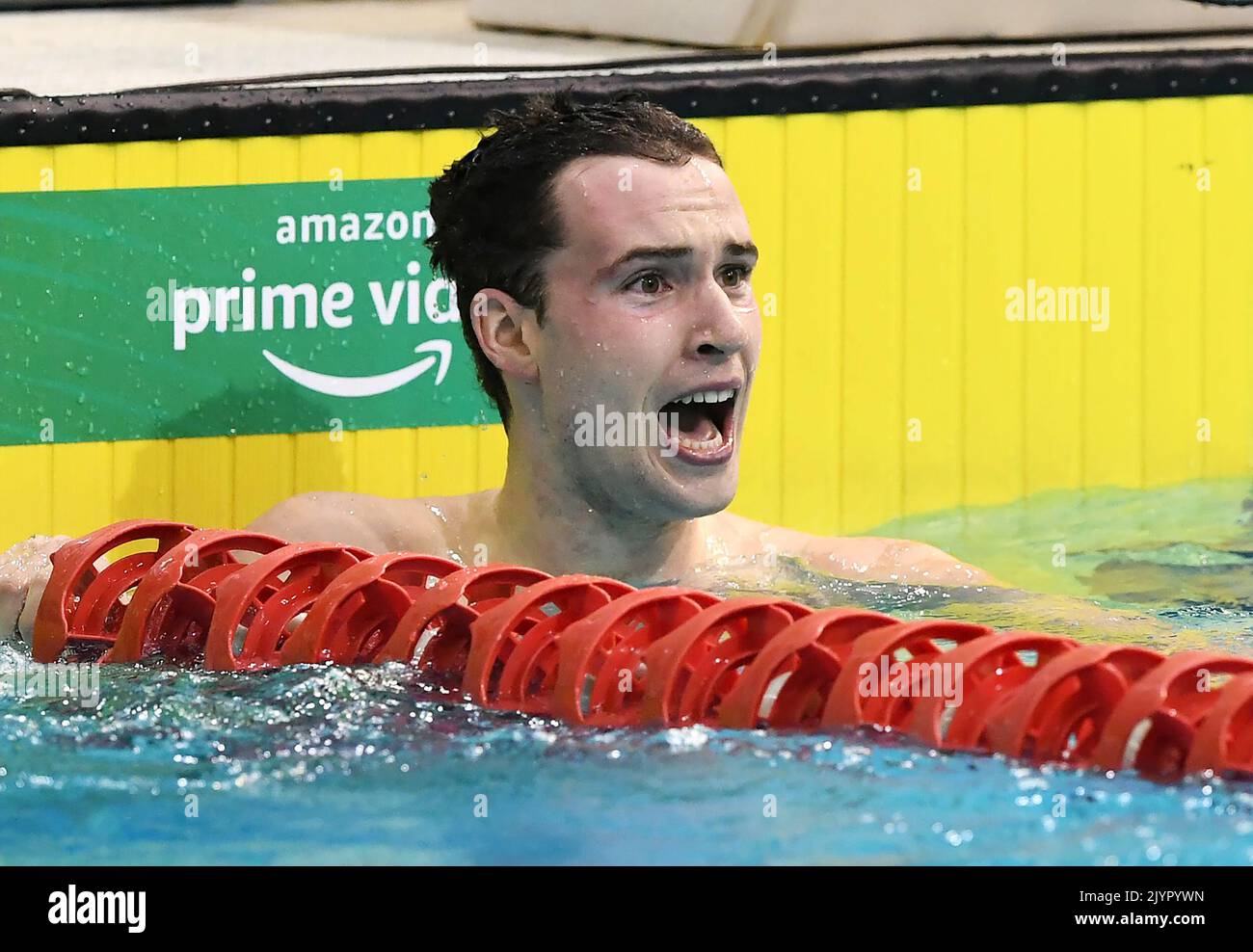 Benjamin Hance reacts after winning the Men’s 100m Butterfly Multi ...