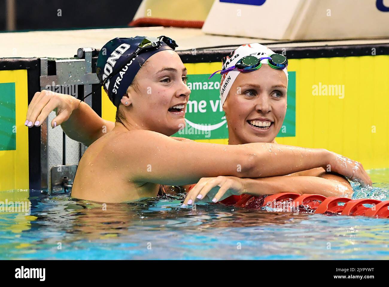 Jenna Strauch (left) reacts with Abbey Harkin following the Women’s ...