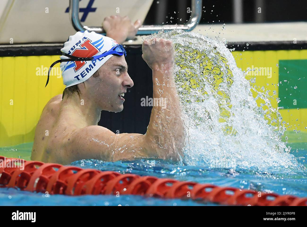 Matthew Temple reacts after winning the Men’s 100m Butterfly Final at ...