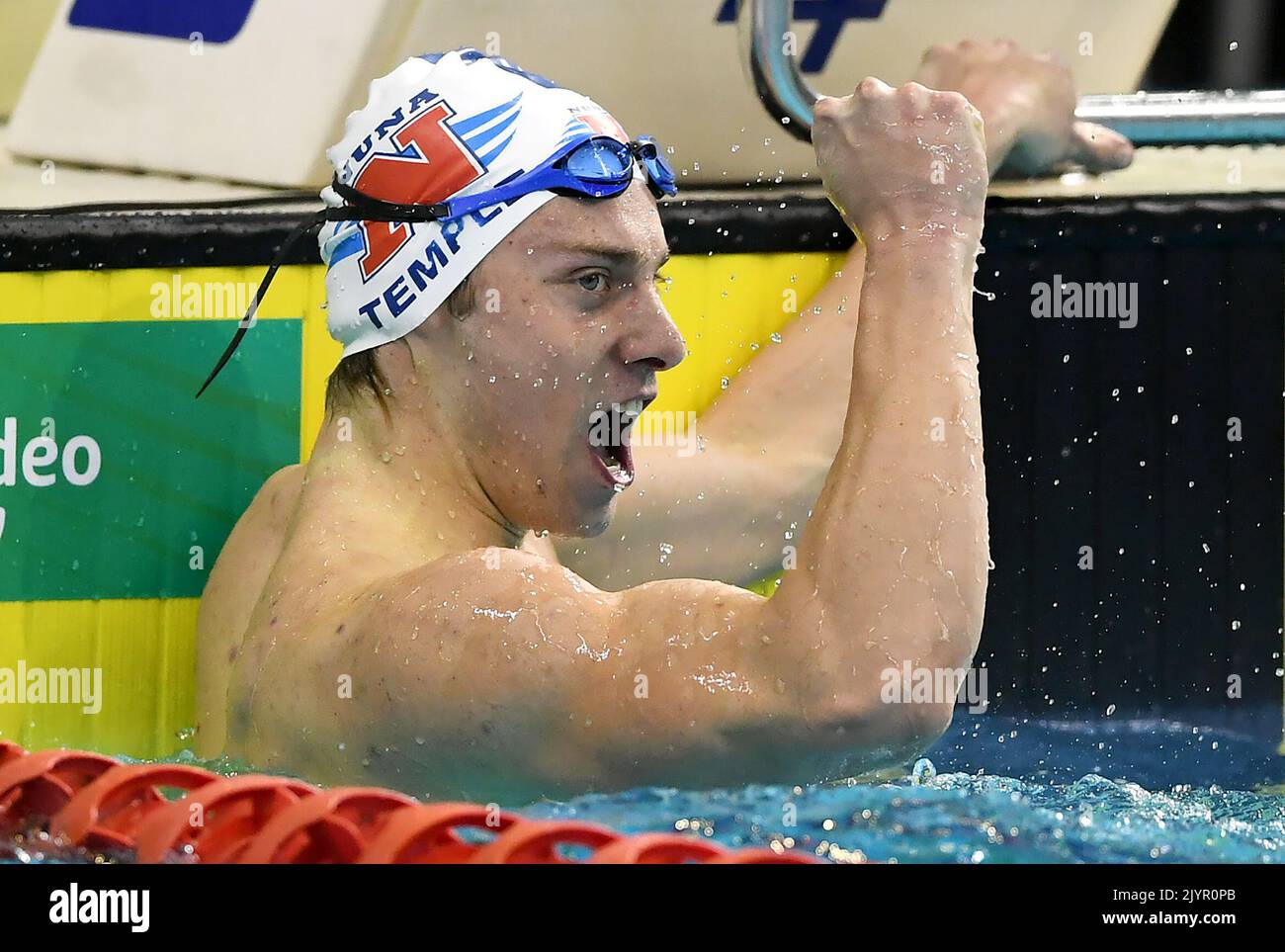 Matthew Temple reacts after winning the Men’s 100m Butterfly Final at ...