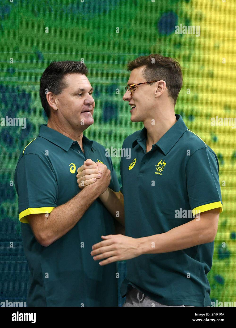 Australian national swim team coach Rohan Taylor (left) is ...