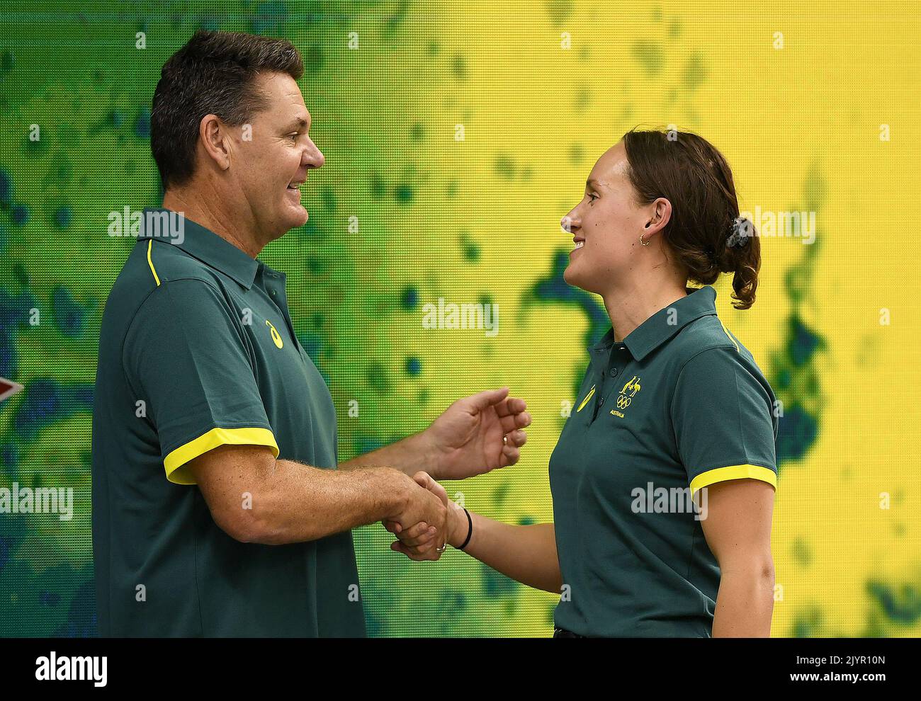 Australian national swim team coach Rohan Taylor (left) congratulates ...