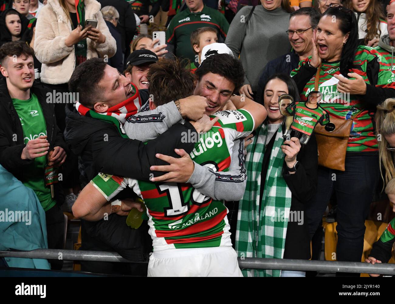 Blake Taaffe (centre) of the Rabbitohs celebrates winning with his ...
