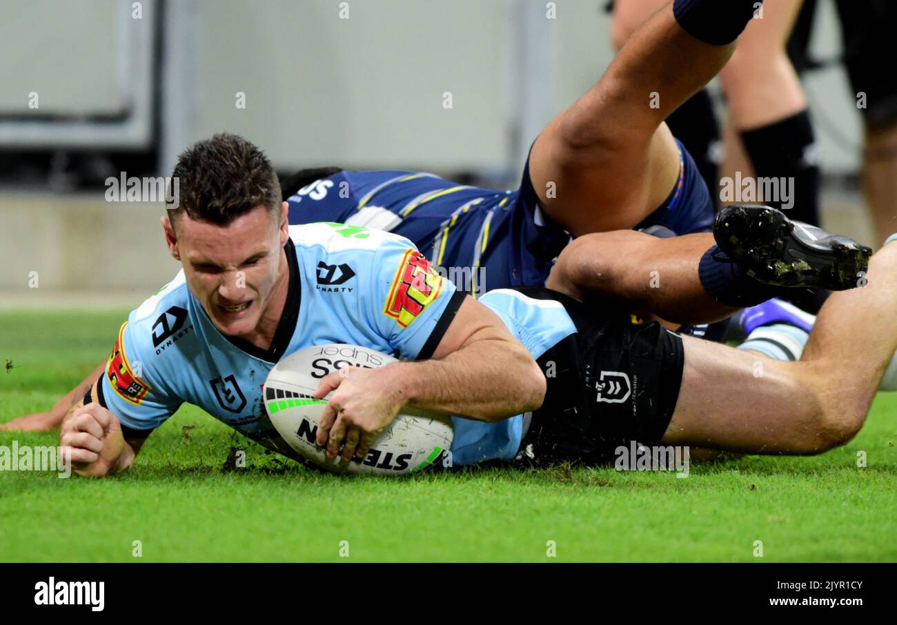 Connor Tracey of the Sharks scores a try during the Round 15 NRL match ...