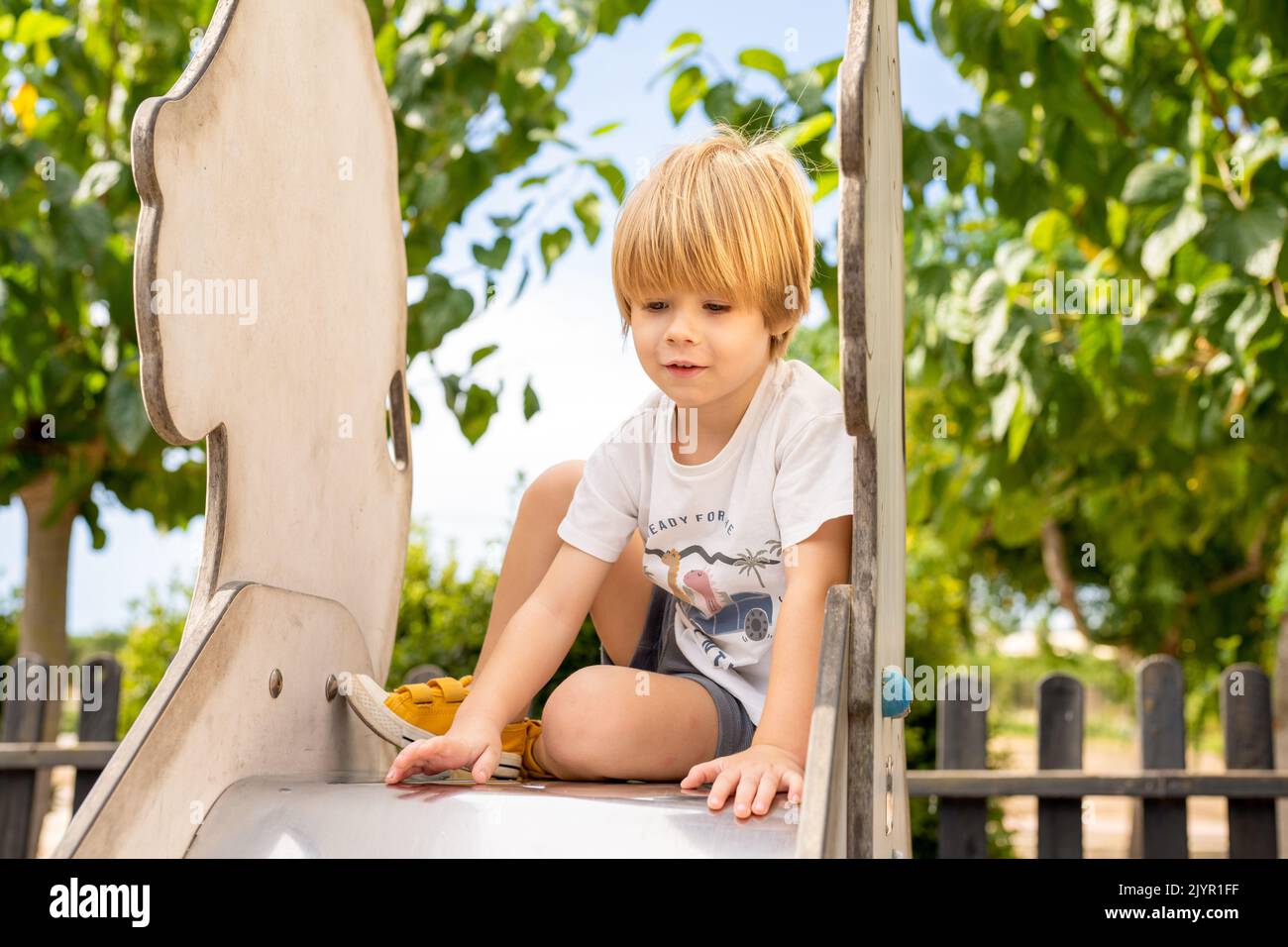 Portrait of a small little cute caucasian boy three years old thinking ...