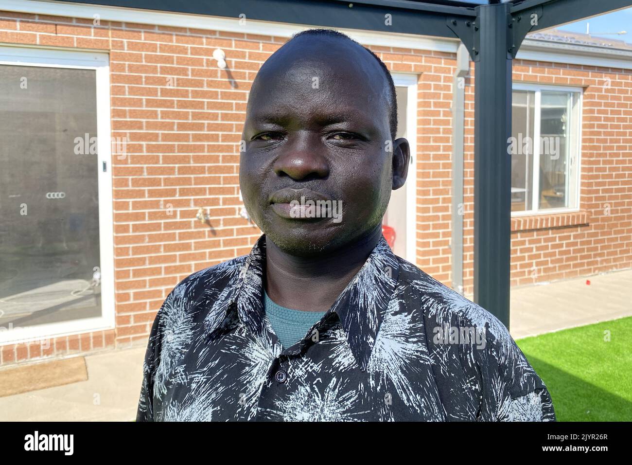Dr Santino Atem Deng poses for a photograph in Tarneit, Melbourne ...
