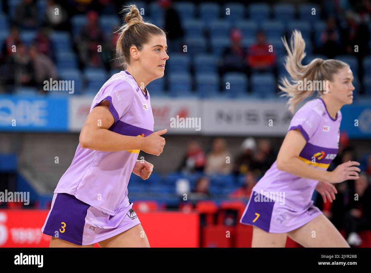 Lara Dunkley of the Firebirds (left) during the warm up ahead of the ...