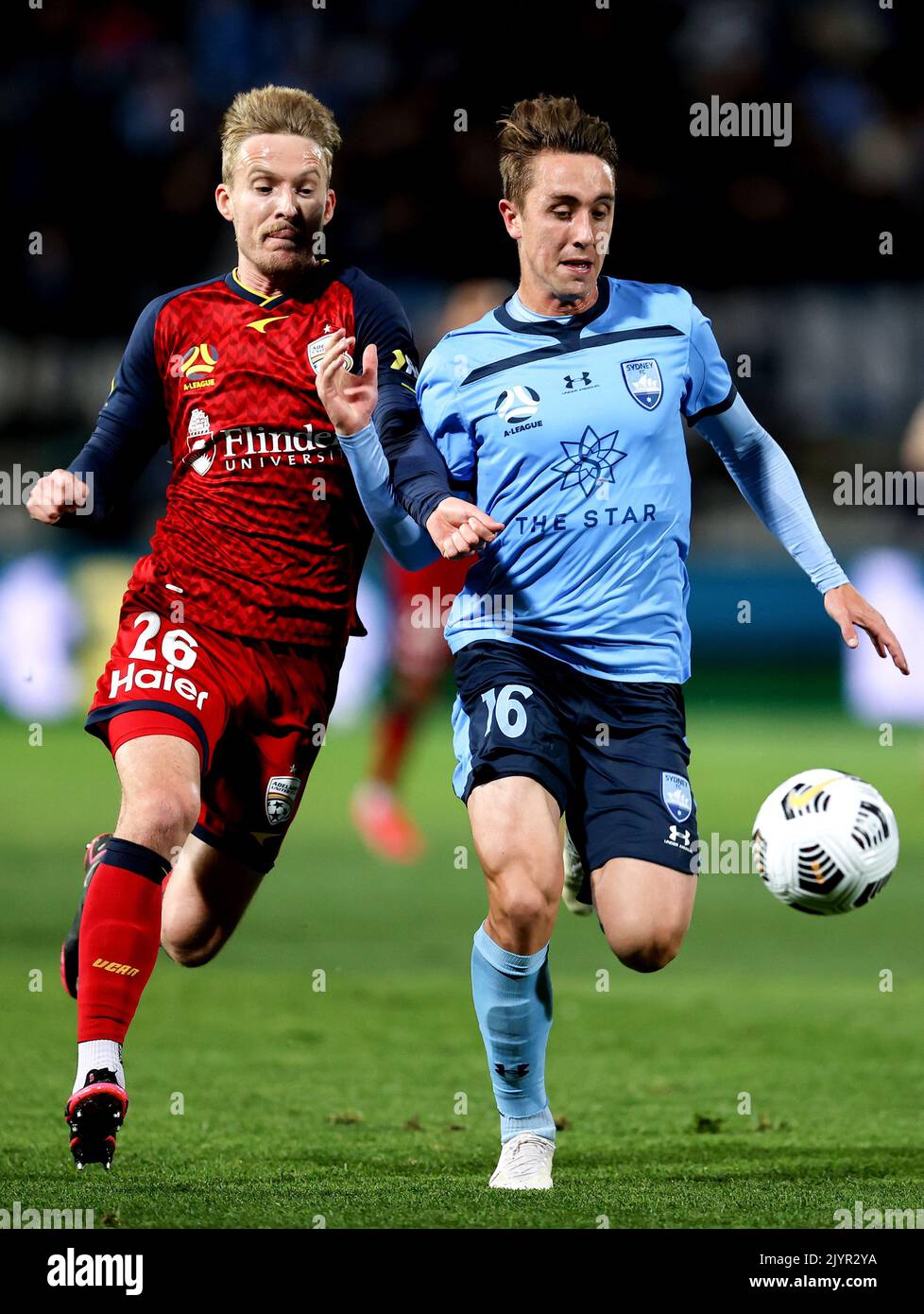 Ben Halloran of Adelaide competes with Joel King of Sydney during the A ...