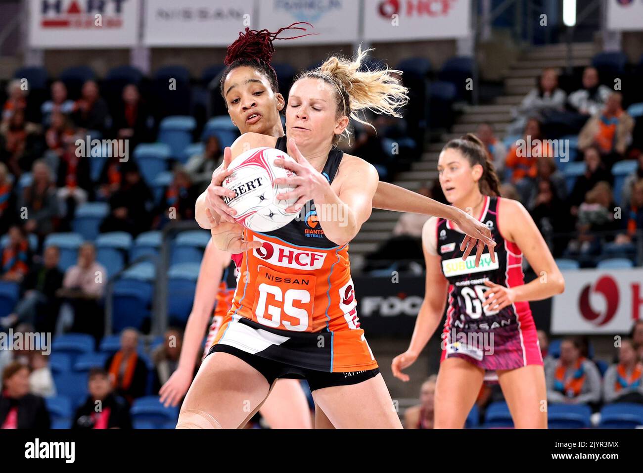 Jo Harten of the Giants competes with Shamera Sterling of the ...