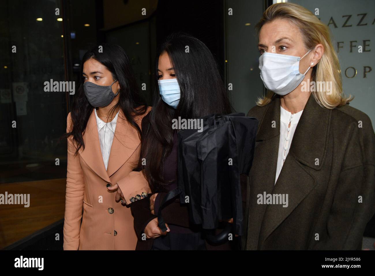 Nicola Annabel Teo (centre) leaves the Downing Centre District Court ...