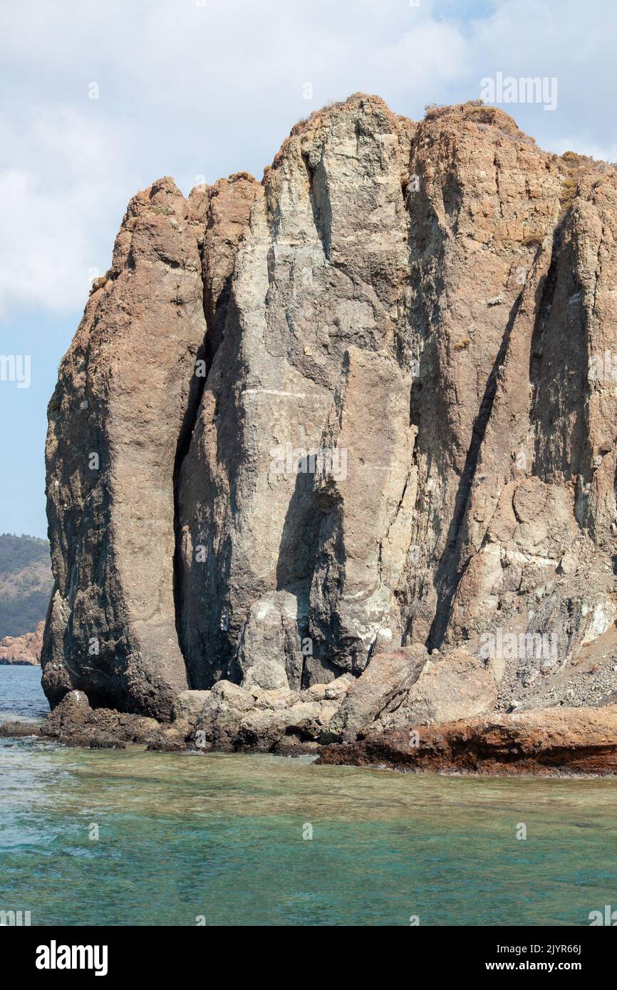 Stone cliff in Aegean sea. High rock in the sea. View from sea. Rock ...