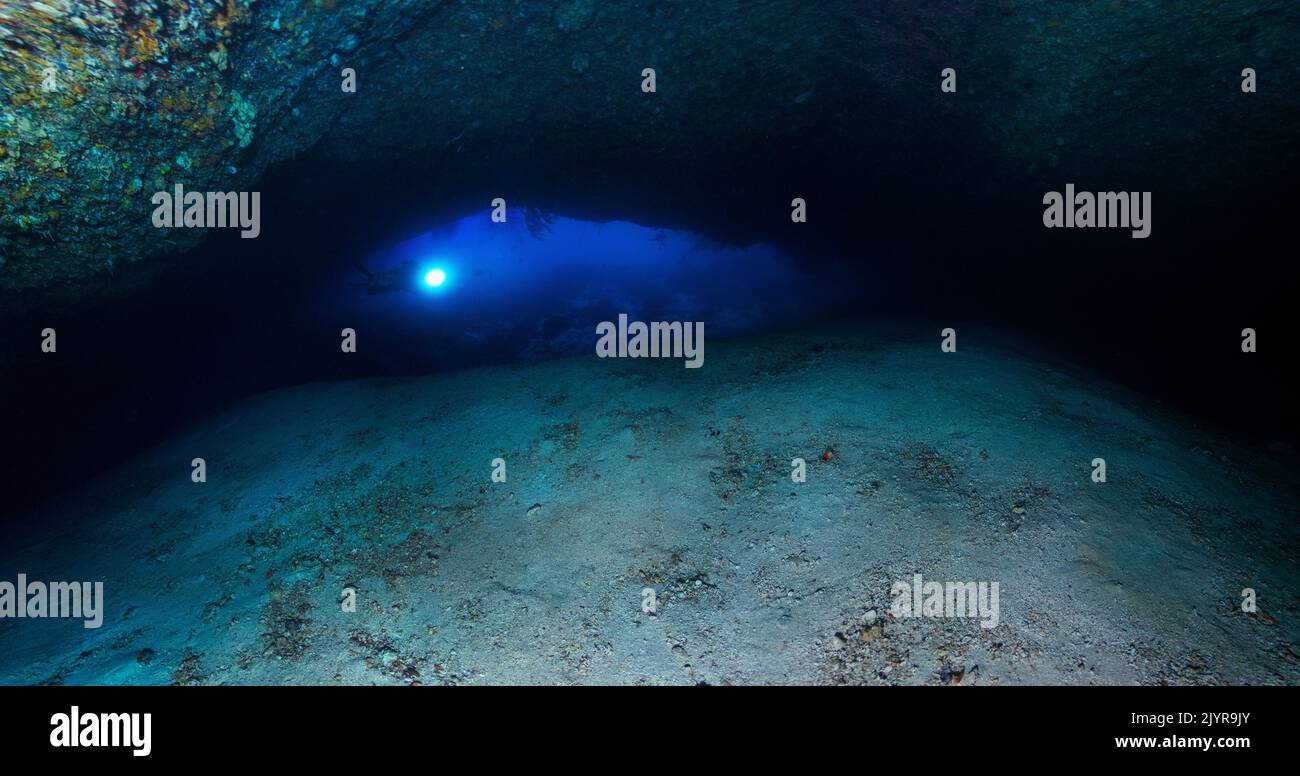 The exit. Panorama of the exit of the cave. Photo taken at a depth of ...