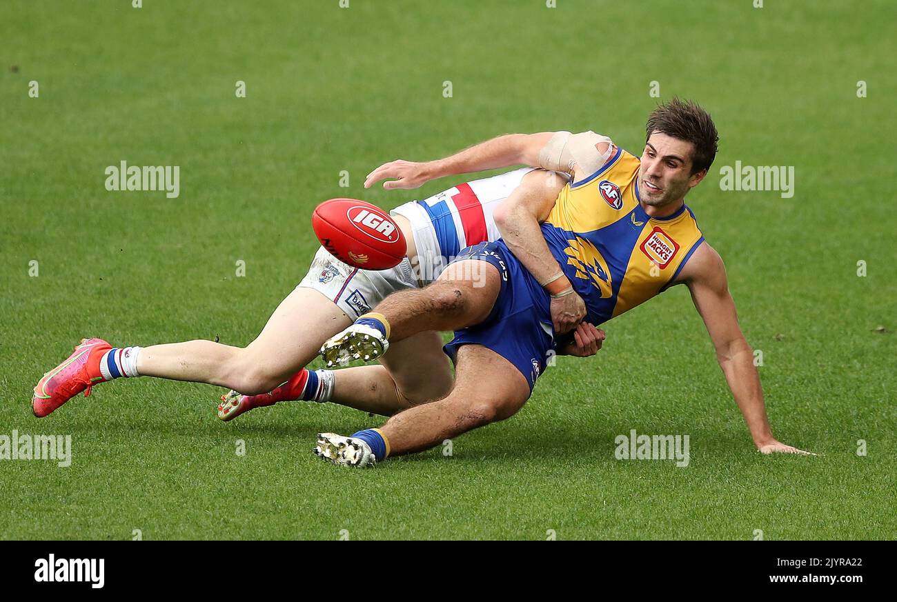 Andrew Gaff of the Eagles is tackled by Taylor Duryea of the Bulldogs ...