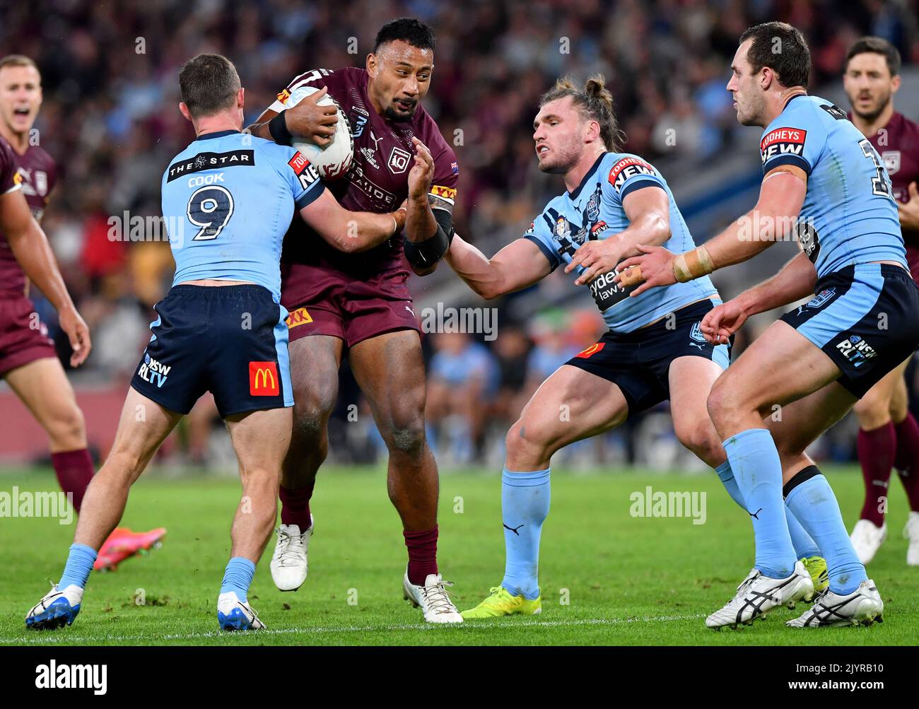 Francis Molo (centre) of the Maroons in action during Game 2 of the ...