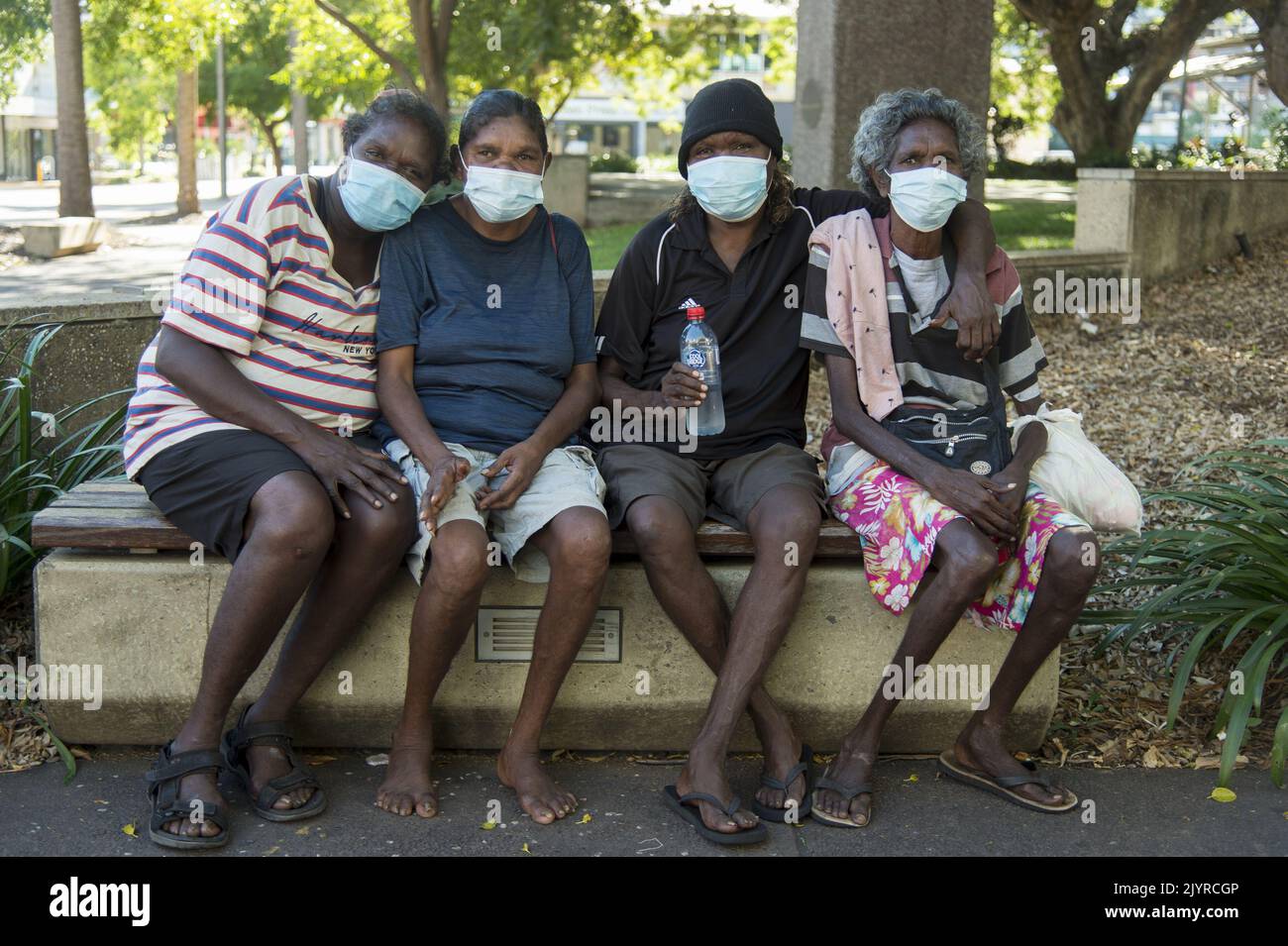 Aboriginal rough sleepers pose for photos in Darwin's Smith Street mall ...