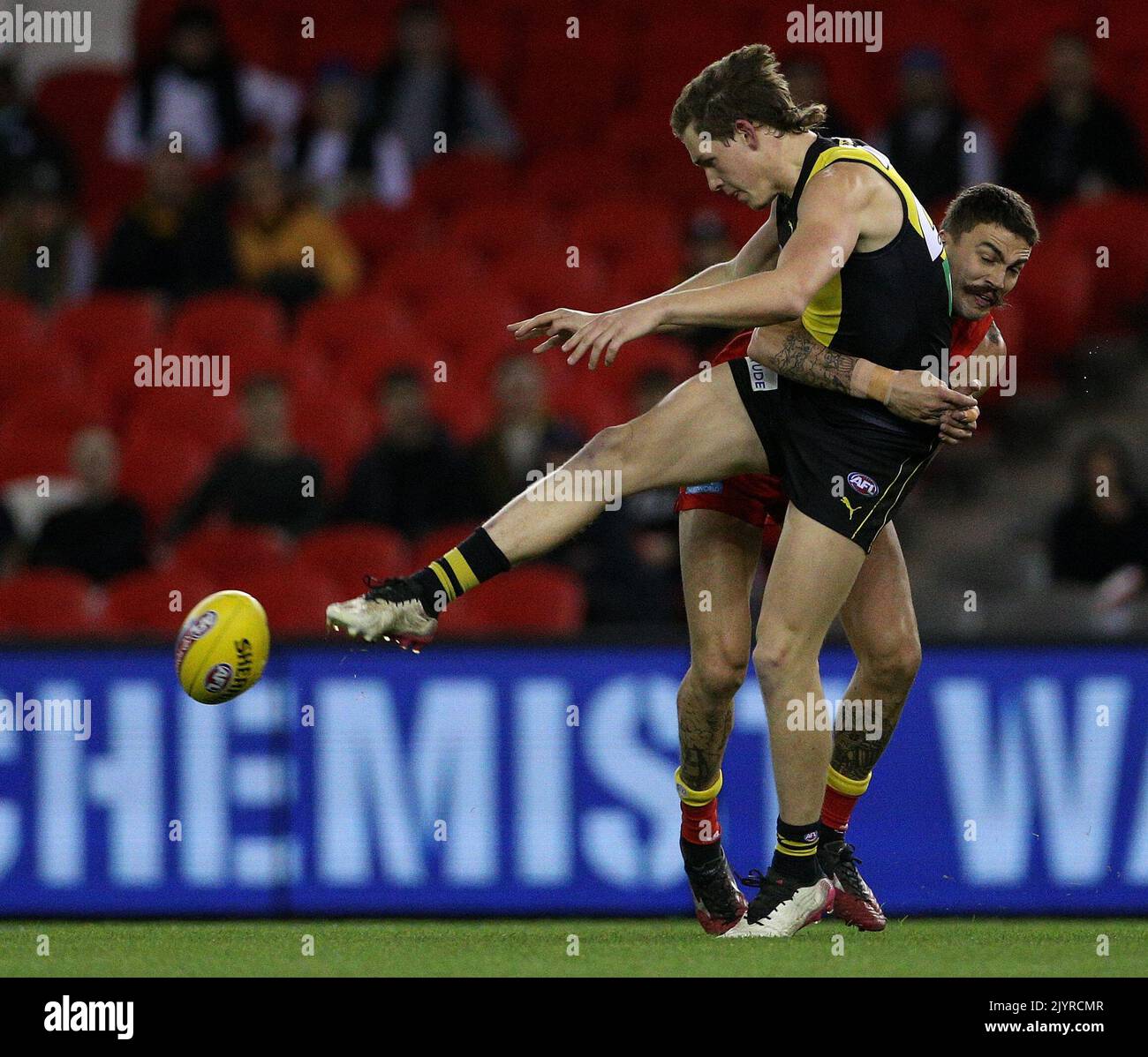 Riley Collier-Dawkins of the Tigers is tackled by Oleg Markov of the ...