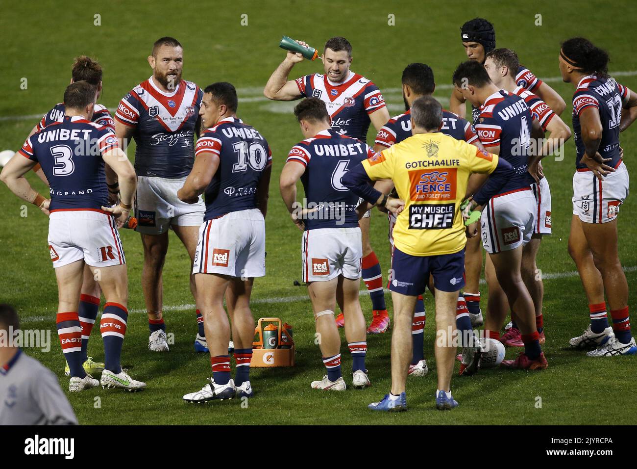 Shell shocked Rooster players during the Round 16 NRL match between the ...