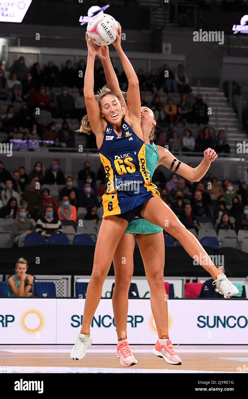 Cara Koenen of the Lightning (left) competes for the ball during the ...